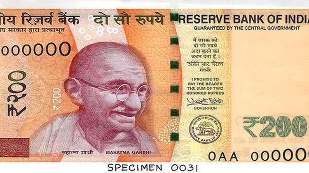 Bright yellow ₹200 note hits market today - The Hindu