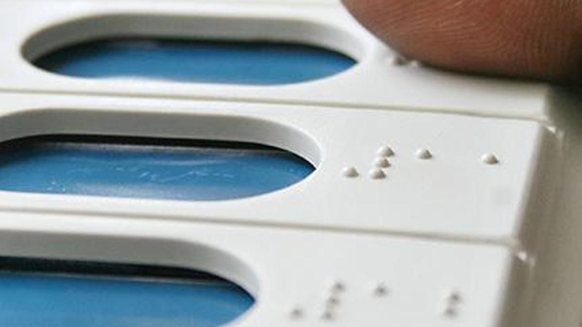 Braille coded electoral identity cards distributed - The Hindu