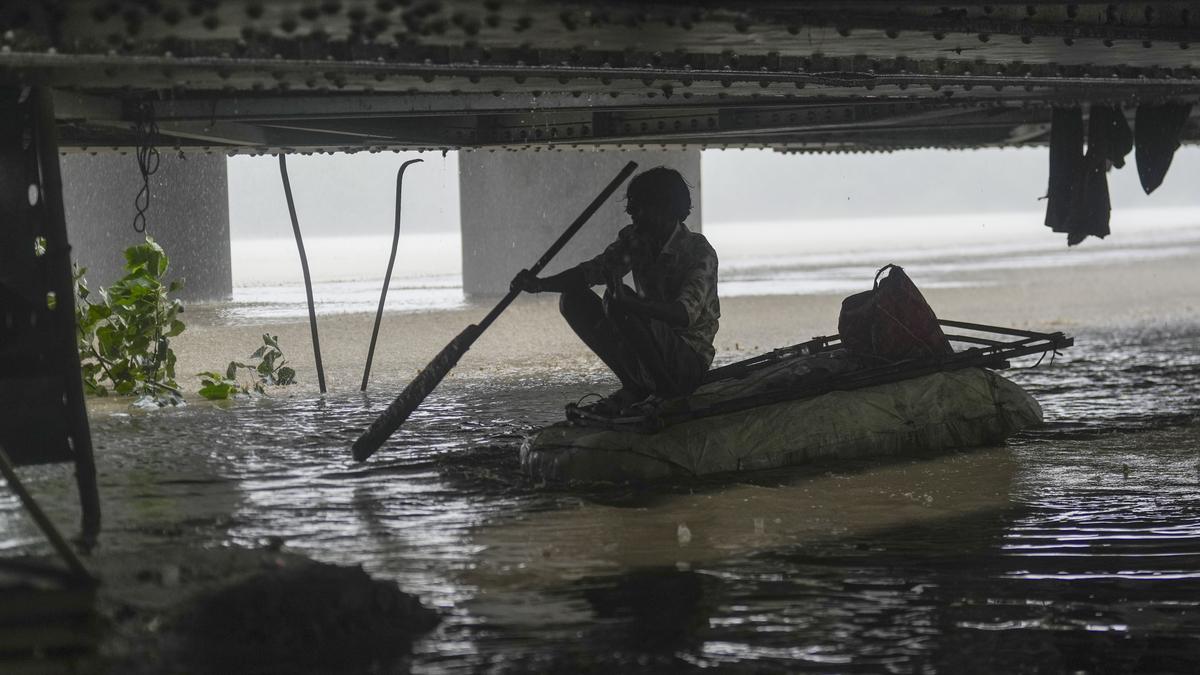 India rain highlights: Rain showers misery on north India; swollen ...