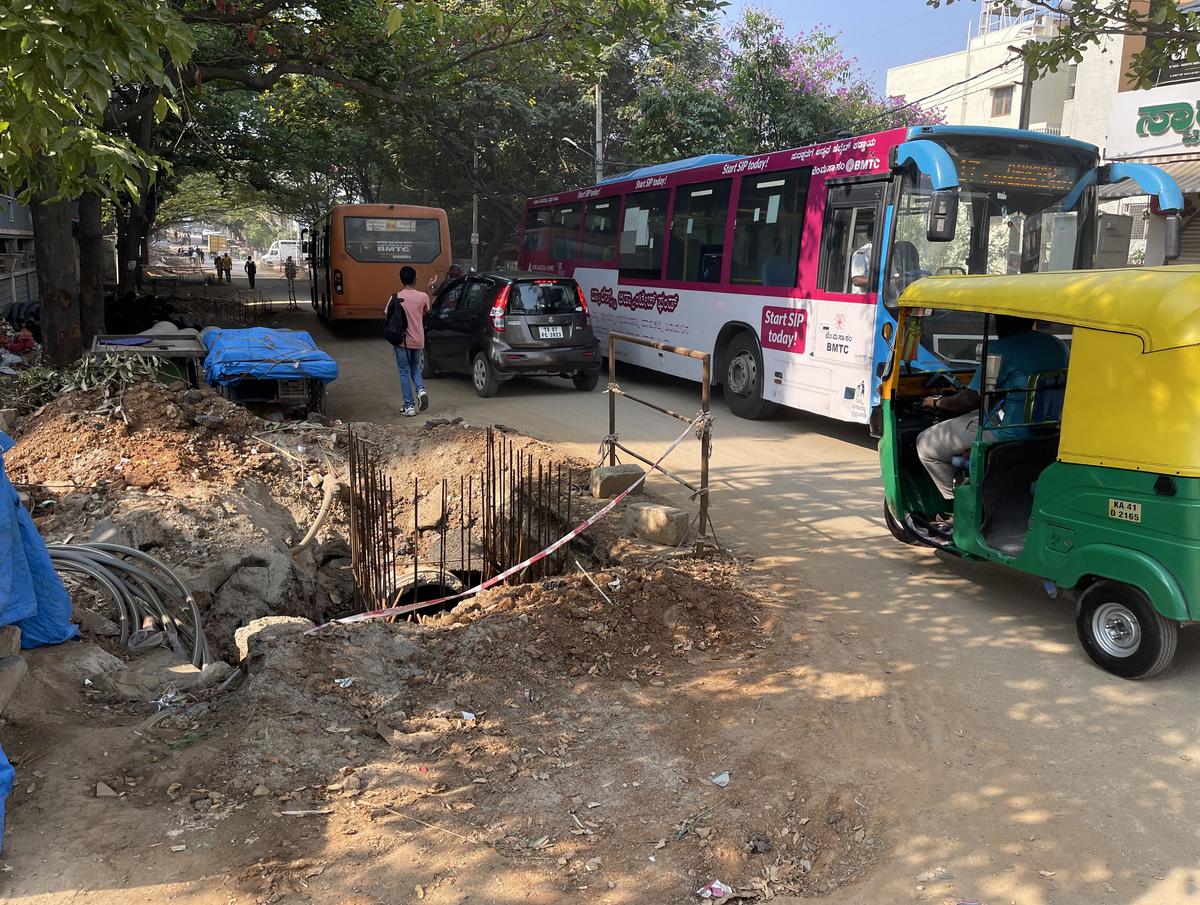 Bengaluru’s white-topping woes: Commuters left with dug-up roads, dust, traffic chaos - The Hindu