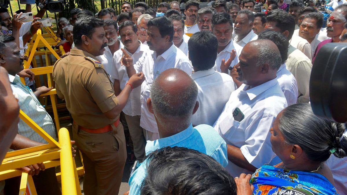 Residents of fishing hamlets in Puducherry stage a protest near the ...
