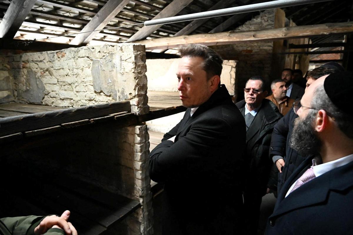 Elon Musk visits Auschwitz after uproar over antisemitic messages on X ...