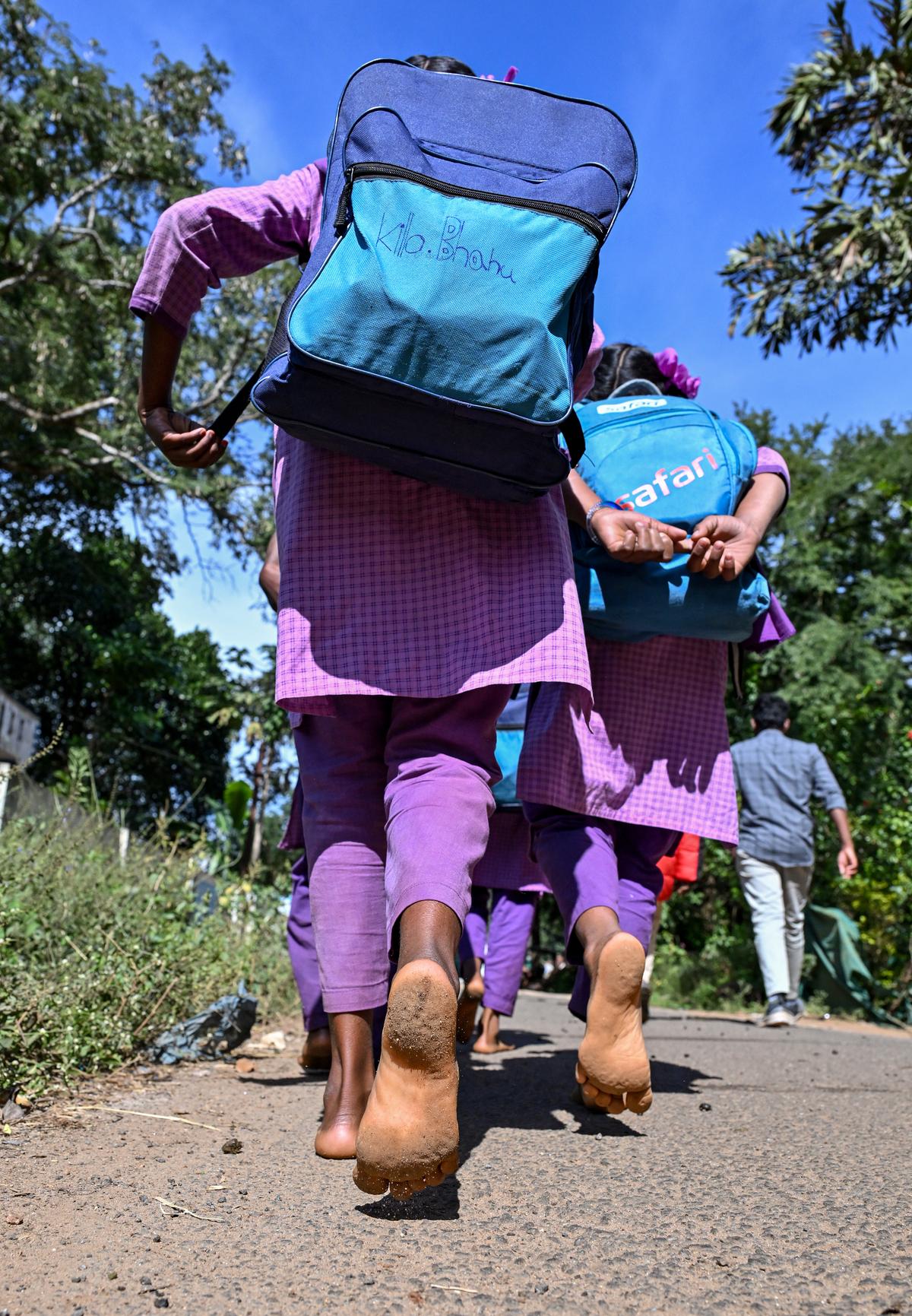 Barefoot trek on a raw road to education - The Hindu