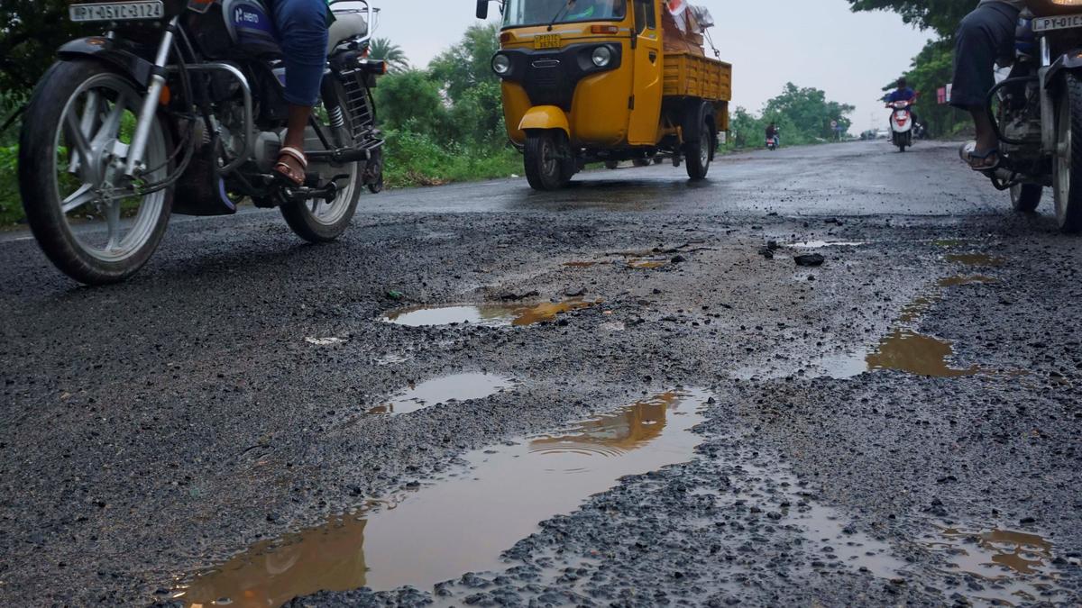 Bumpy ride for motorists on potholed roads - The Hindu