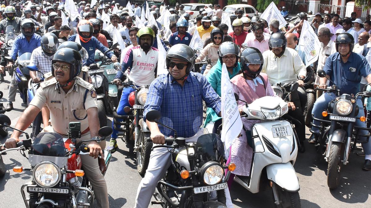 District administration officials take out bike rally to create voting ...