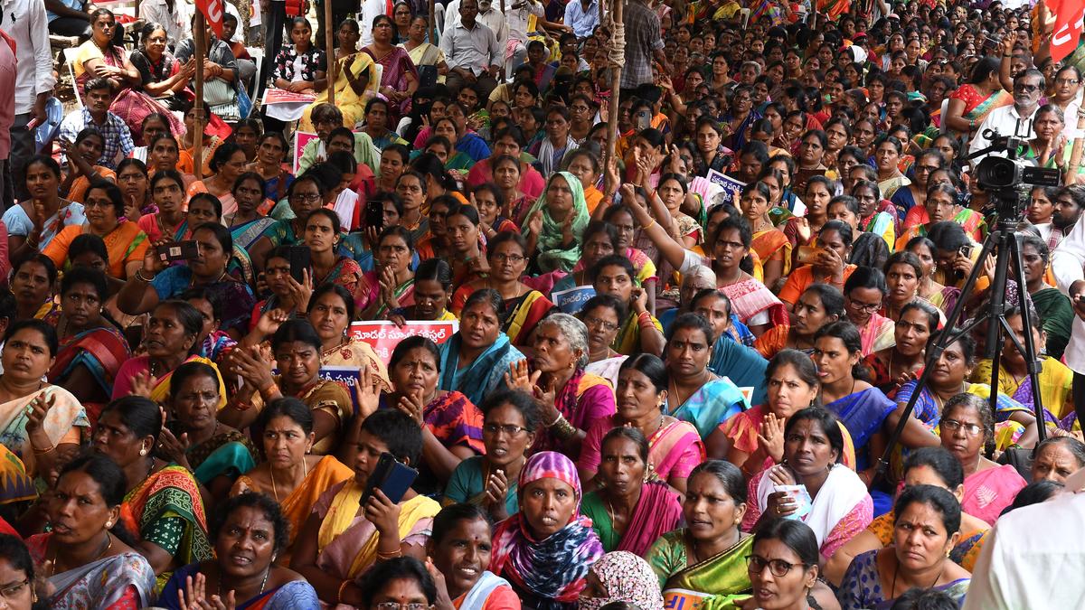 Workers stage protest demanding regularisation of service - The Hindu