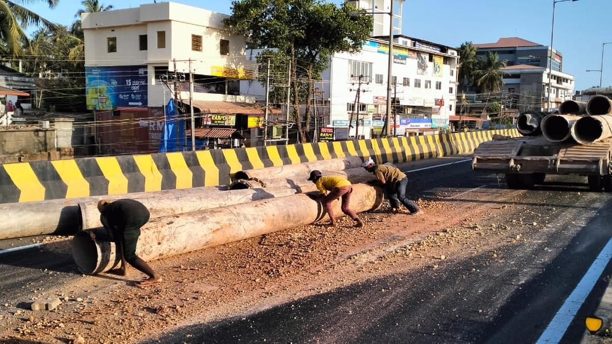 Traffic affected as water pipes fall from moving trailer-truck - The Hindu