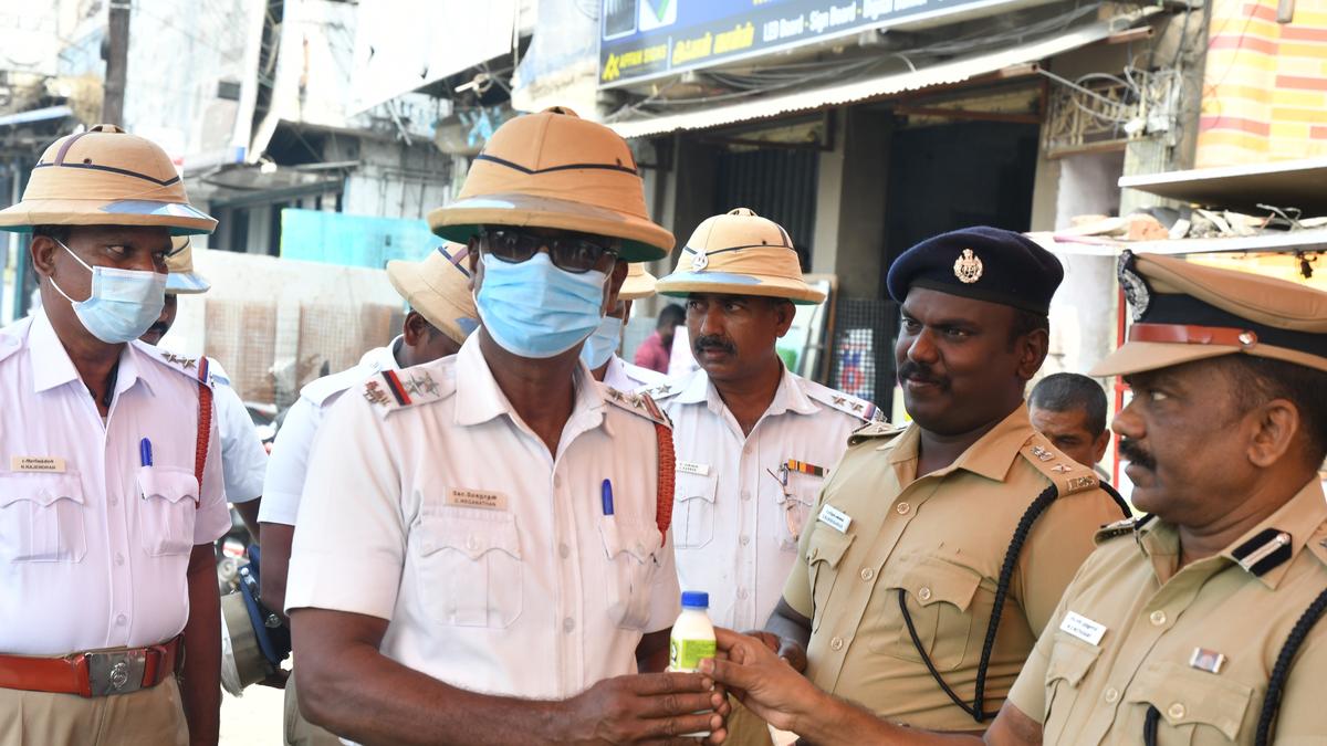 Traffic police personnel get butter milk, juice, hats in Vellore, nearby districts - The Hindu