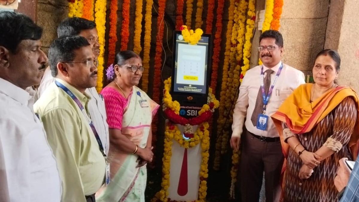 SBI donates digital QR machine to TTD - The Hindu