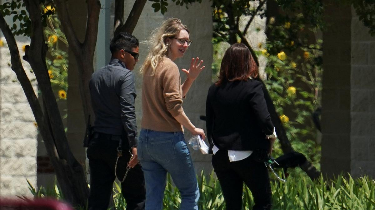 Elizabeth Holmes enters Texas prison to begin 11-year sentence for ...