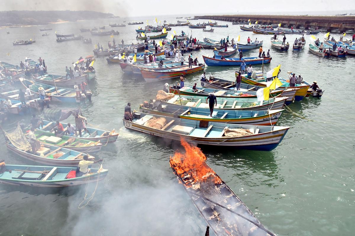 Fishermen set fire to a fishing vessel, attack media persons as ...