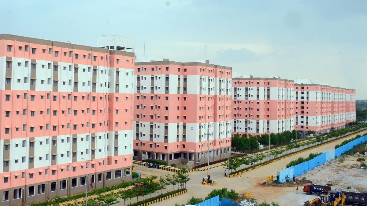 Telangana Chief Minister KCR hands over keys to six 2BHK beneficiaries ... Telangana Chief Minister KCR hands over keys to six 2BHK beneficiaries ...
