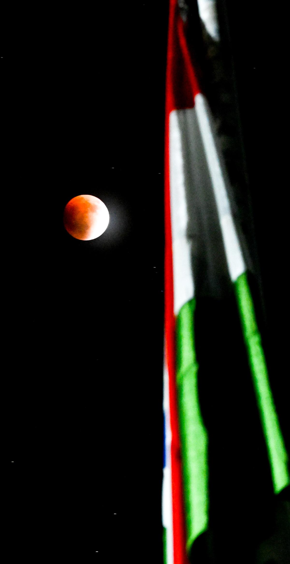 In Pictures: Blood Moon lights up the sky - The Hindu