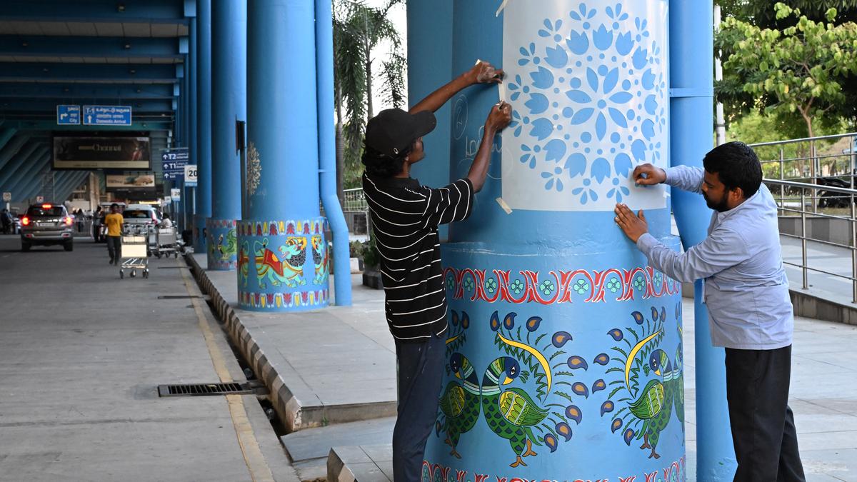 Work to paint murals on pillars outside Chennai airport terminals ...