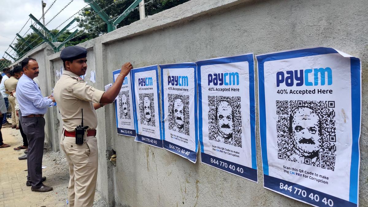 'PayCM' posters with CM Bommai's face surface in Bengaluru - The Hindu