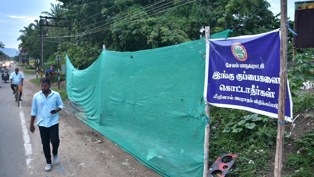 Salem Corporation covers garbage vulnerable points with nets to prevent ...