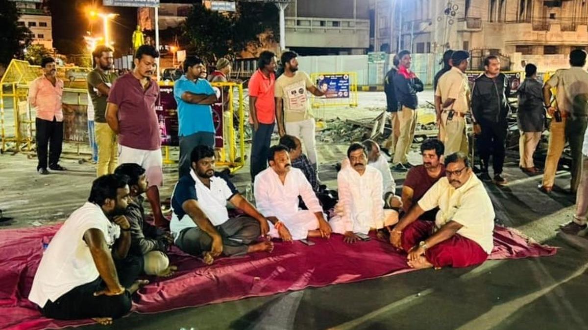 Ballari civic body members protest against removal of old clock tower ...