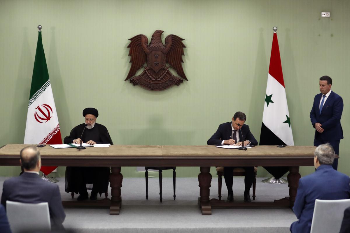 On landmark visit, Iran's Raisi praises Syria 'victory' despite ...