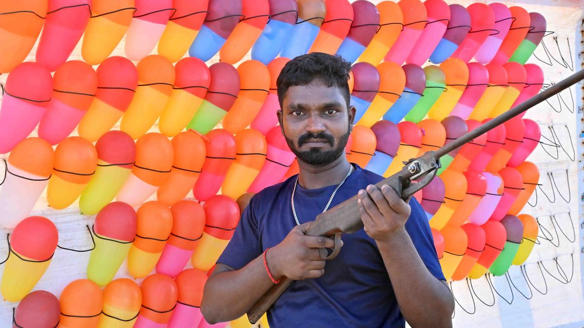 Life in the day of a balloon shooting stall proprietor at Marina beach ...