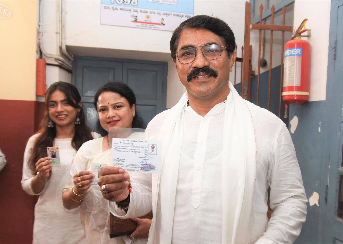 People line up enthusiastically in front of polling stations to cast their vote in Dakshina ...
