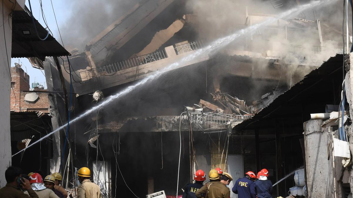 Building in north Delhi collapses after blaze, close shave for ... Building in north Delhi collapses after blaze, close shave for ...