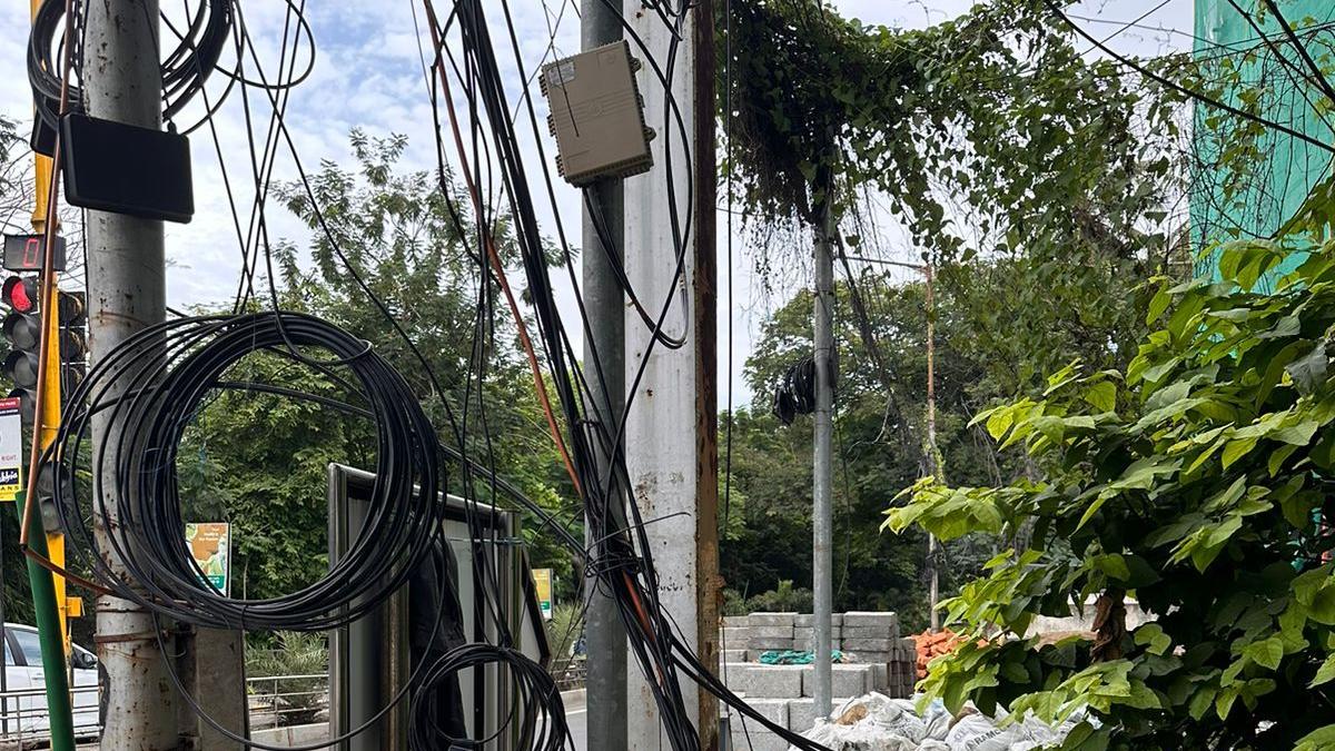 In Chennai, dangling cables, damaged footpaths around telecom poles ...