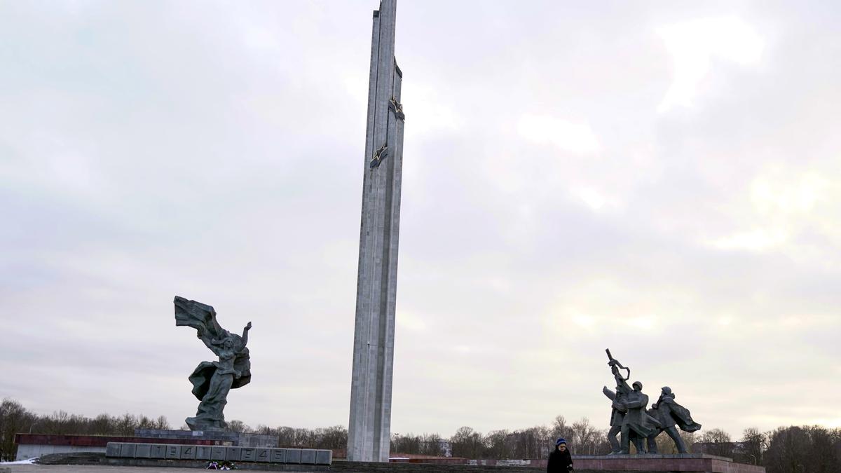 Soviet-era monument's iconic obelisk pulled down in Latvia in response ...