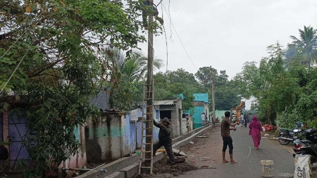 Electric poles removed from newly-constructed storm-water drain near ...