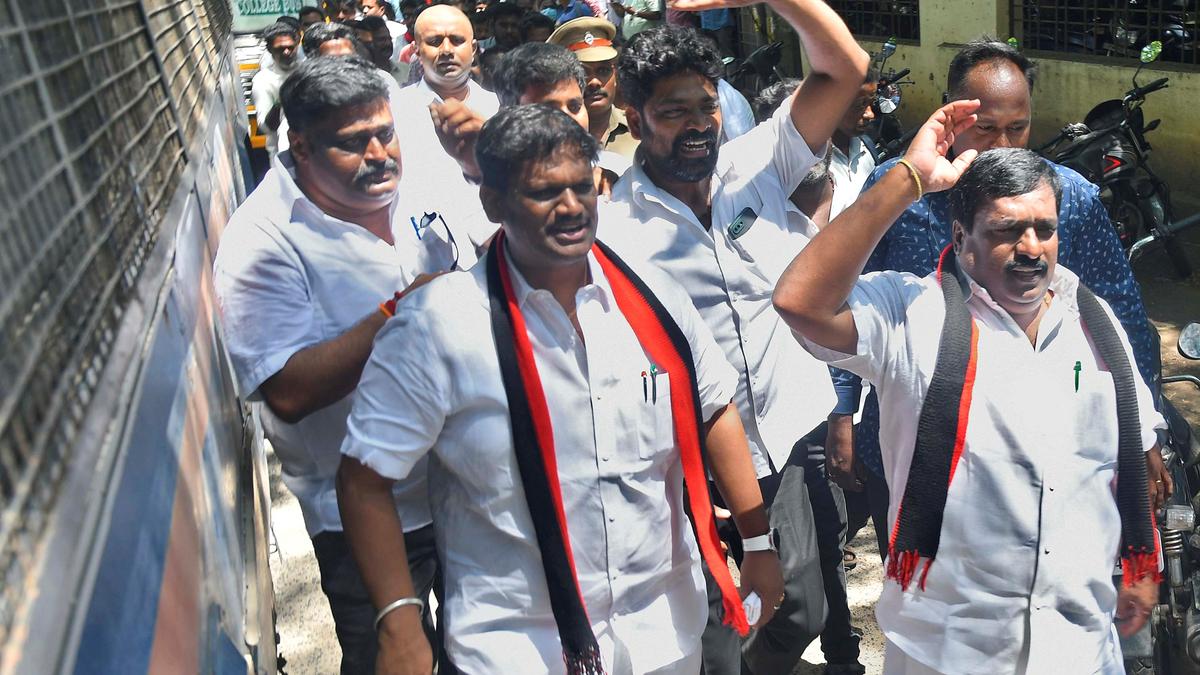 DMK cadre protest seeking reopening of PDS outlets, court arrest - The ...