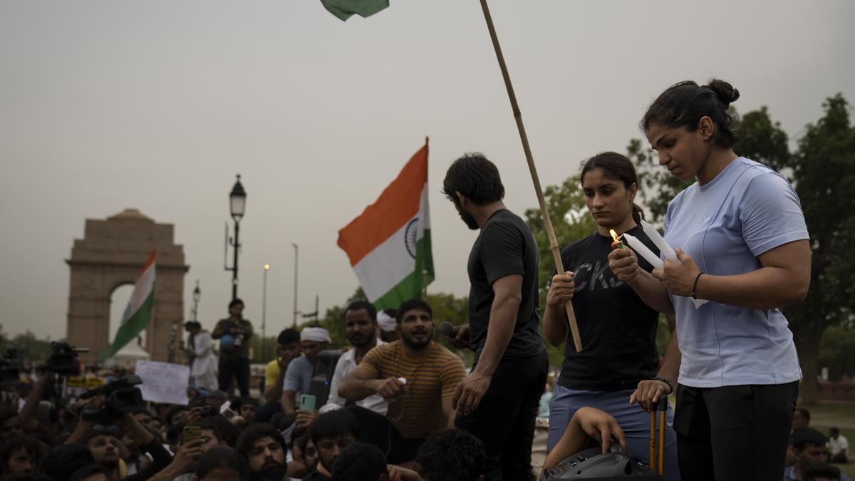 To mark a month of wrestlers’ protest, candlelight vigil at India Gate ...