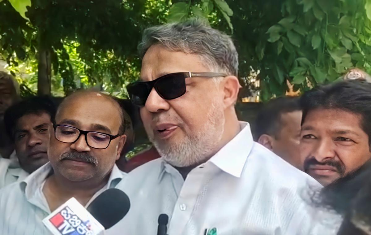 Supporters gather outside Tanveer Sait’s house after his desire to ...