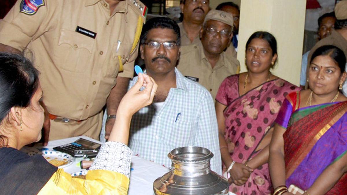 Over 2,000 IMFL shops allotted by draw of lots - The Hindu