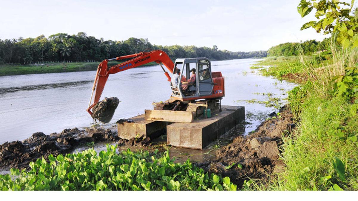 Rise in water level hits mudbank removal work - The Hindu