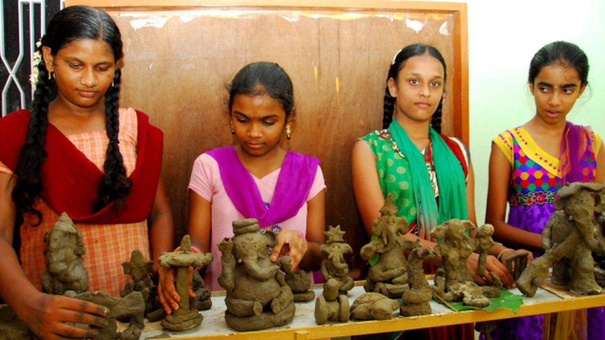 Children make clay Ganesh idols at workshop - The Hindu