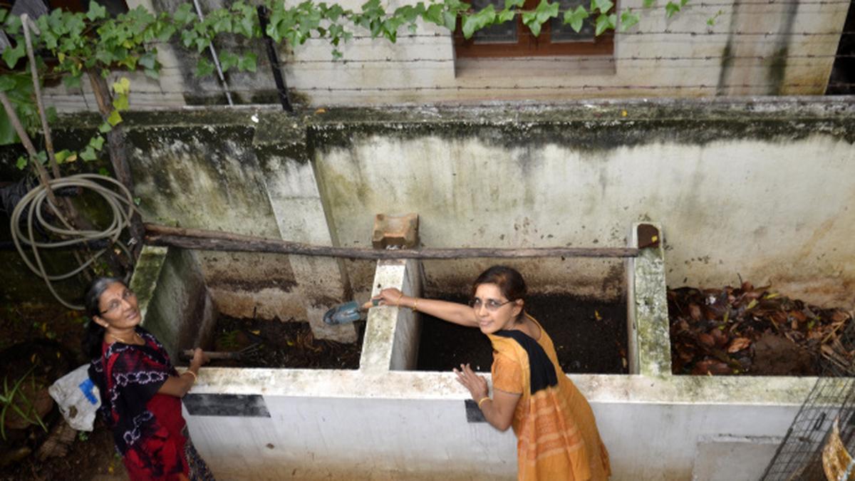 Two women demonstrate bio-composting techniques - The Hindu