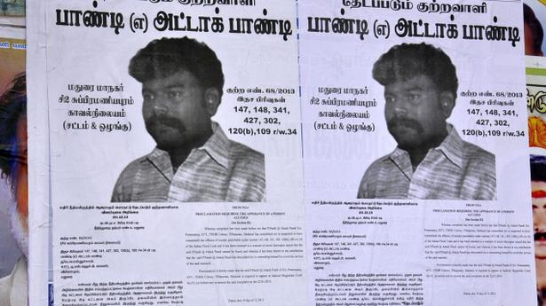 Police paste posters of ‘Attack’ Pandi in Madurai - The Hindu