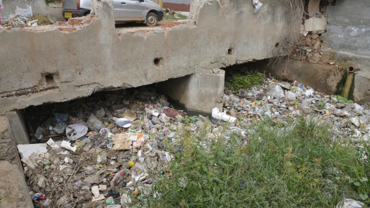 Silt-filled canal troubles Singanallur residents - The Hindu
