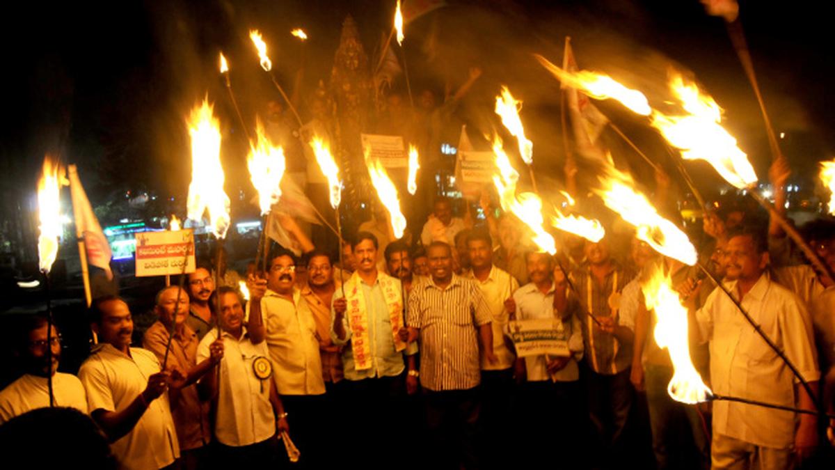 RTC employees organise torch rally for united Andhra Pradesh - The Hindu