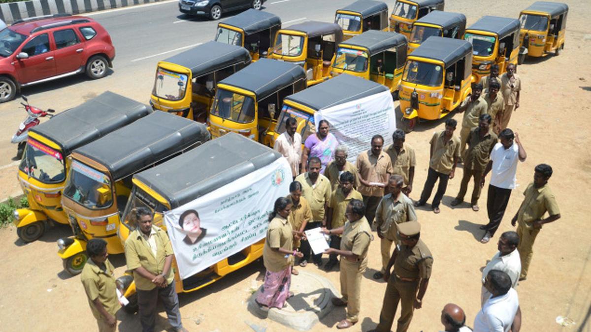 New fare cards distributed to autorickshaw drivers - The Hindu