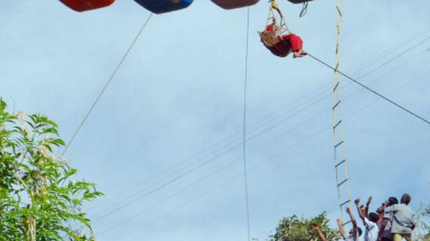 Tension mounts as rope car with 28 pilgrims dangles in mid-air - The Hindu