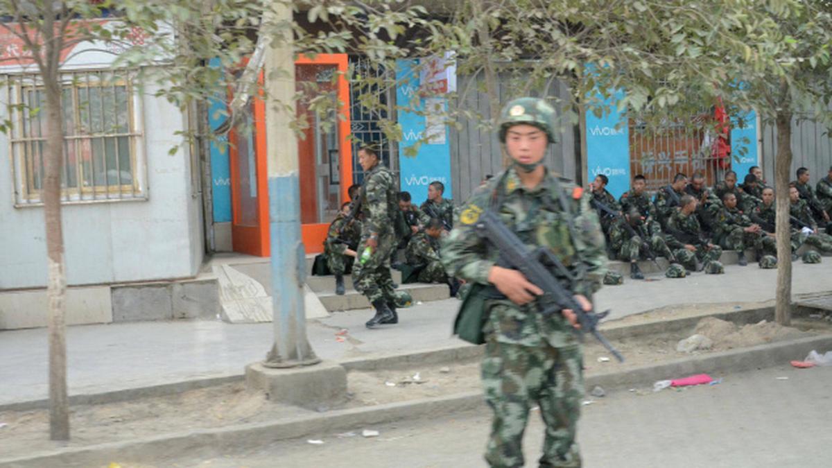 China boosts security in Xinjiang after bloodshed - The Hindu