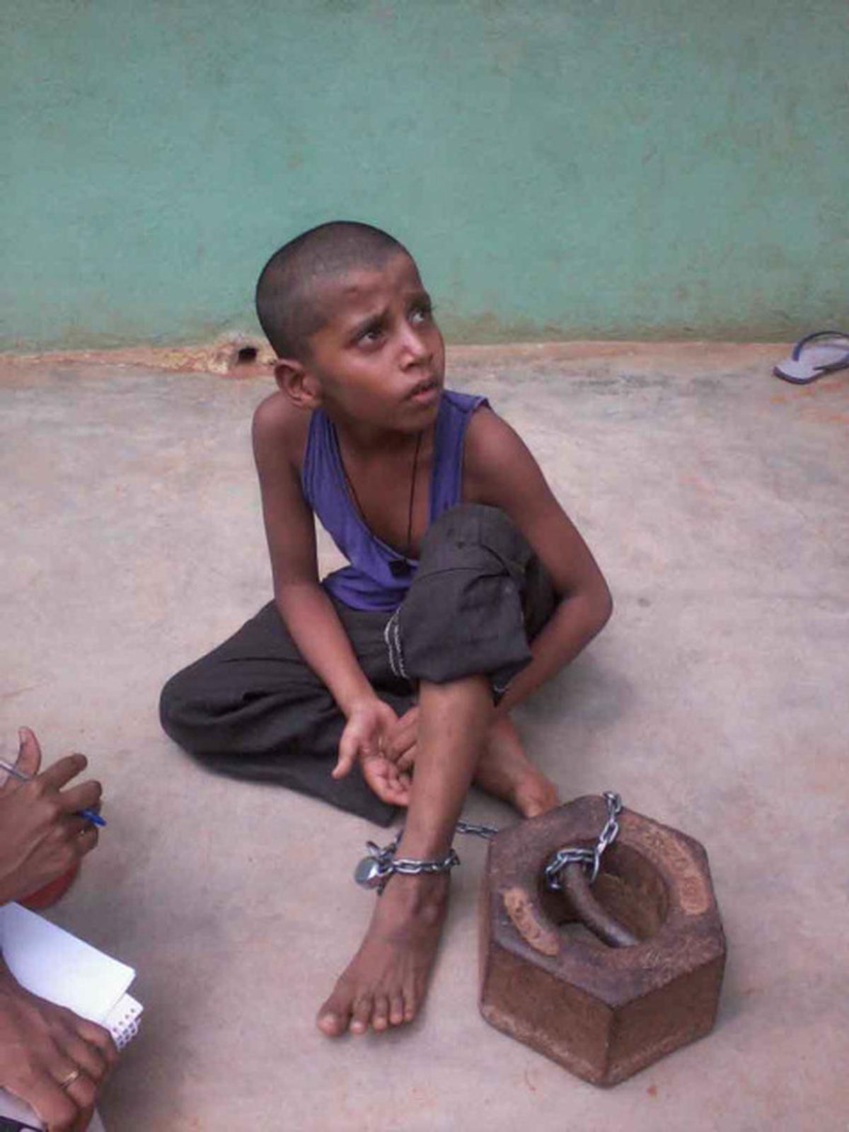 Boy chained by father rescued - The Hindu