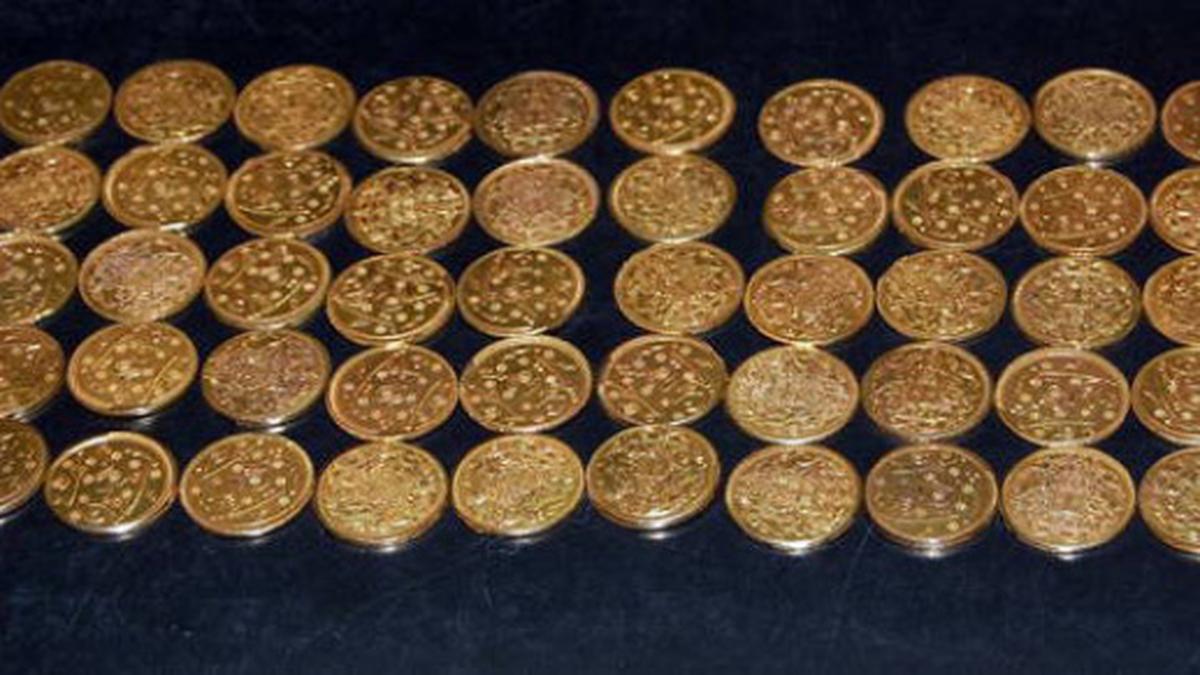 Fake gold coins seized, five held - The Hindu