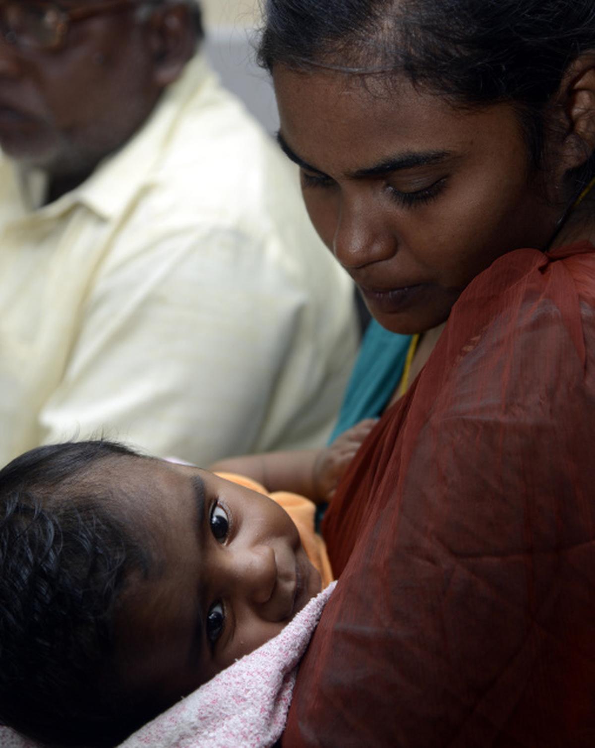 Two surgeries later, infant’s eyes flutter open - The Hindu