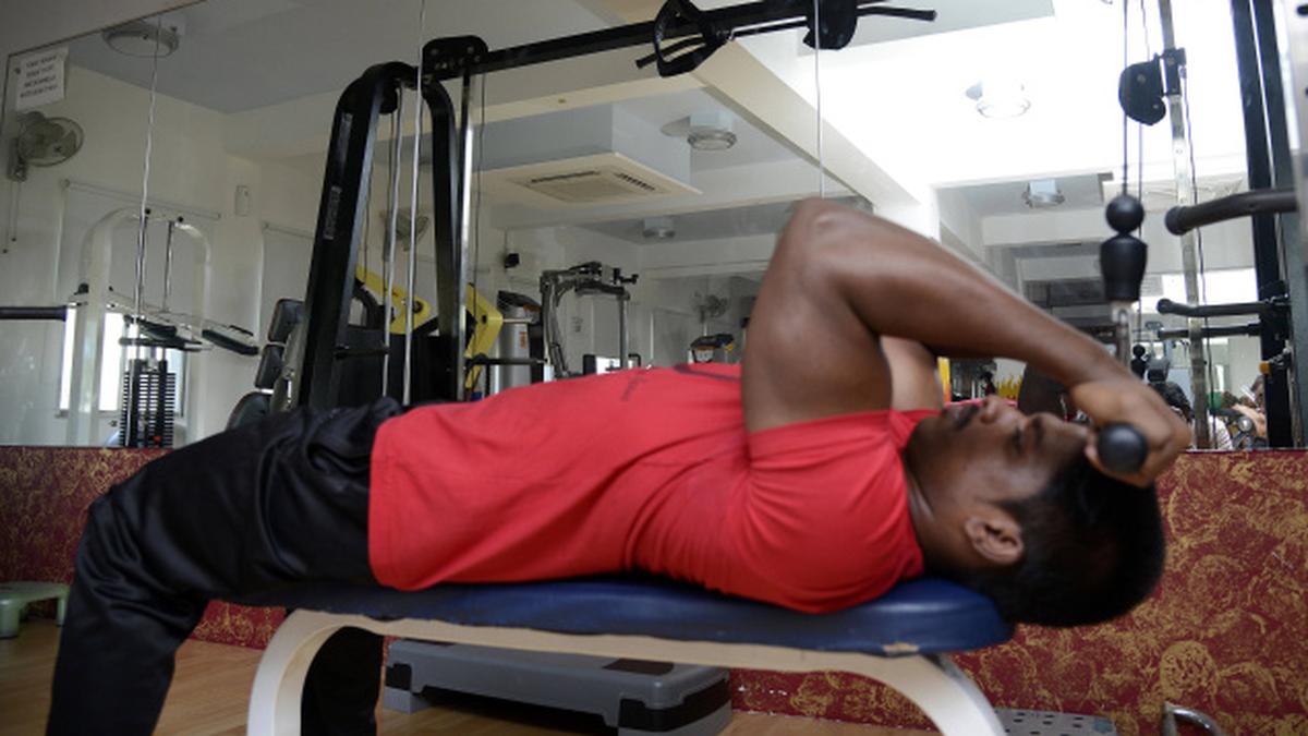 Lying overhead cable curl - The Hindu