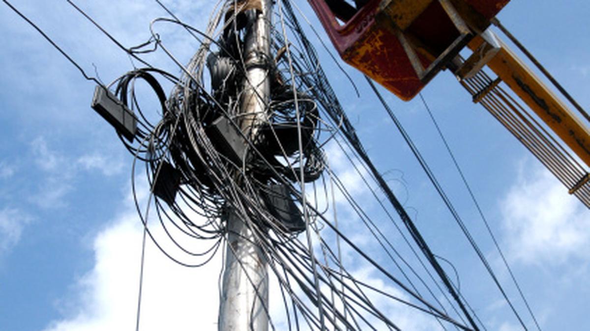 Dangling cables removed - The Hindu