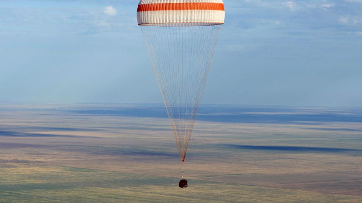 Expedition 32 crew lands safely as Sunita takes over command - The Hindu