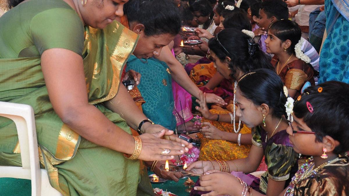 Children perform “Mathru” puja - The Hindu
