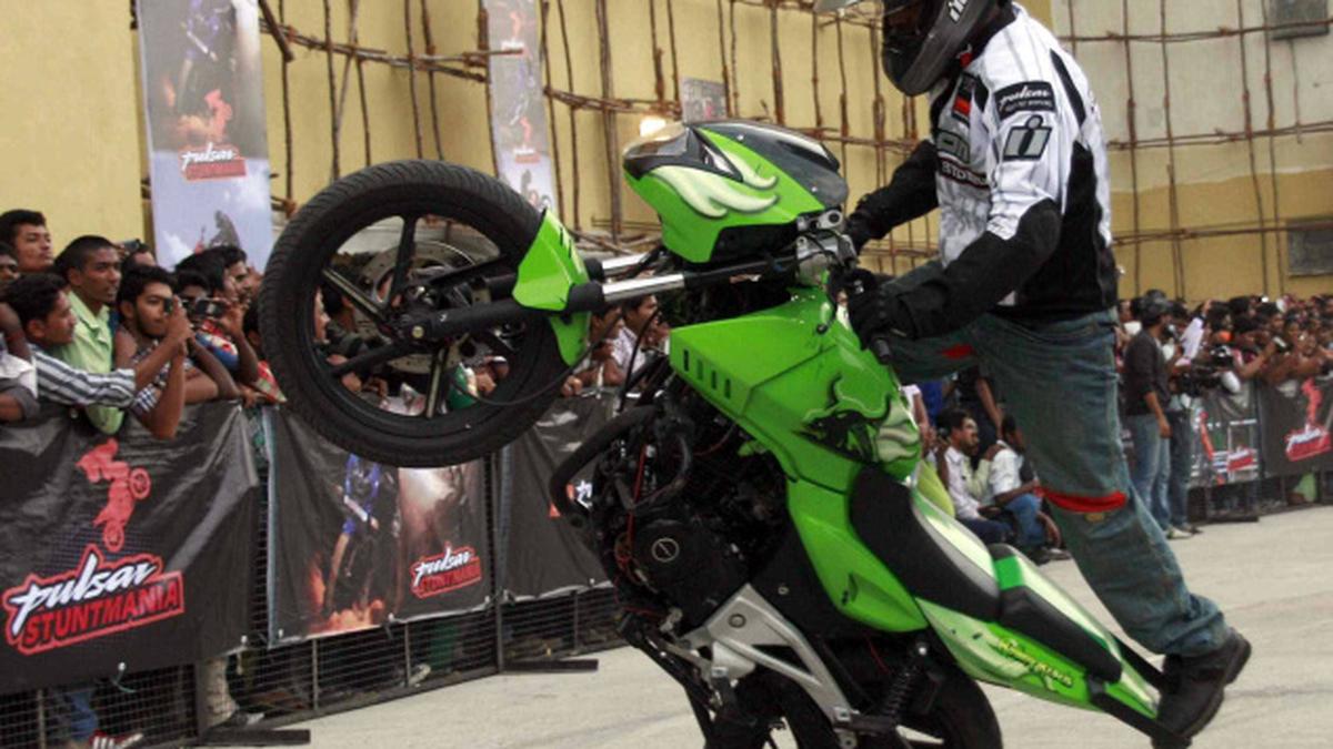 Daredevil bike stunts leave shoppers awestruck - The Hindu