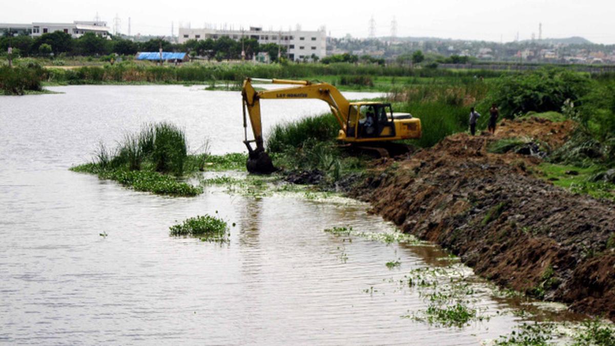 Desilting of water channels under way - The Hindu